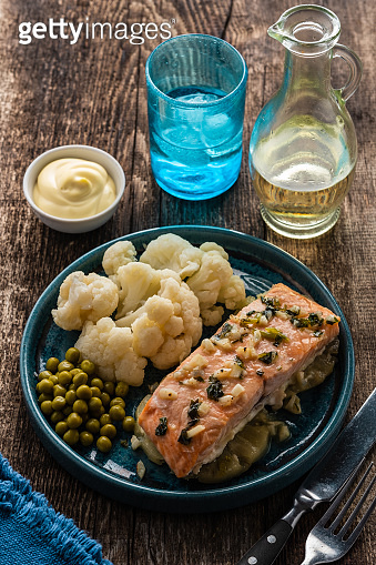 Solomon fillet with pineapple and cauliflower. Fish with vegetables ...