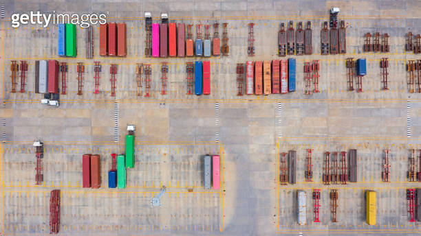 Aerial view semi truck with cargo trailer parking with other trucks on ...