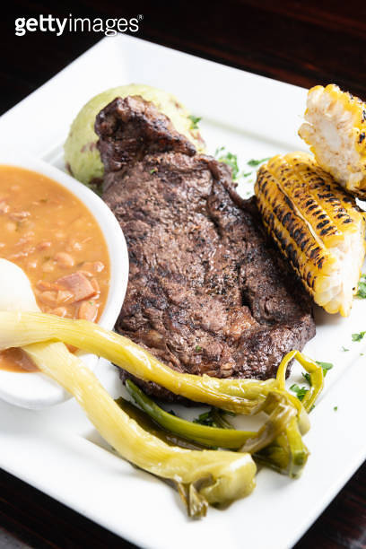 Roast beef with beef and beans (Mexican style grilled rib eye steak ...