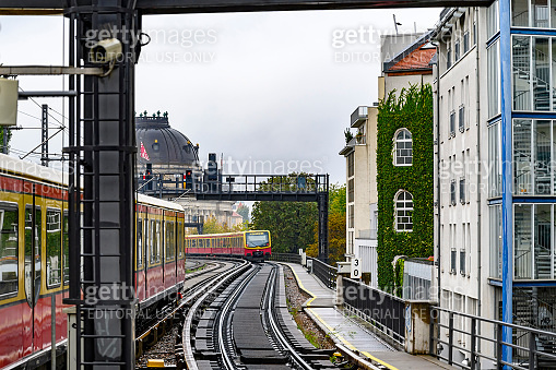 Two trains in front of a rail station of the Berlin S-Bahn in the ...