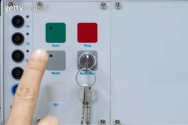Male Hand Pushing Reset Button of Control Panel (1090773132) - 게티이미지뱅크