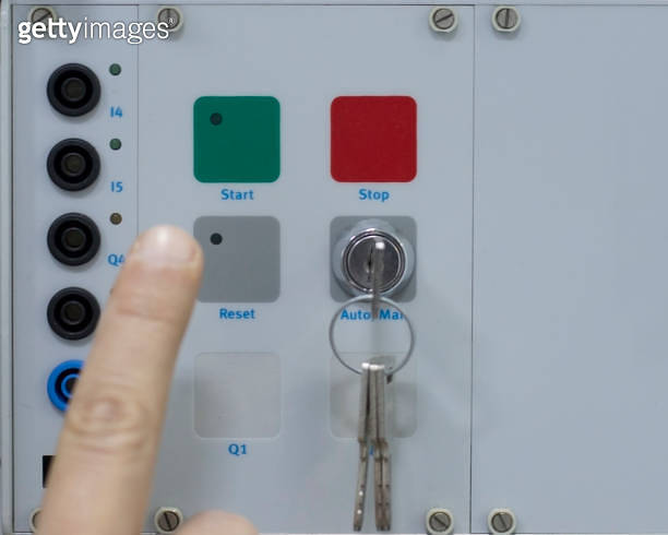 Male Hand Pushing Reset Button of Control Panel (1090772716) - 게티이미지뱅크