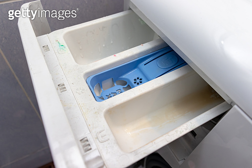 Dirty moldy washing machine detergent and fabric conditioner dispenser ...