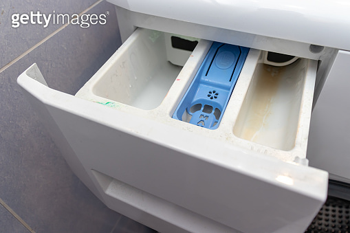 Dirty moldy washing machine detergent and fabric conditioner dispenser ...