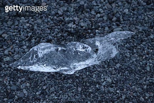 Naturally formed ice sculpture on the beach near the Jokulsarlon ...