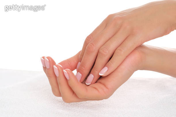 Beautiful, female hands with perfectly done manicure on studio shoot ...