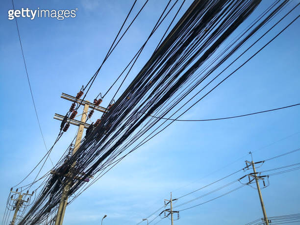 Tangle of Electrical cables and Communication wires on electric pole ...