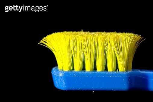 Blue and yellow used professional soft toothbrush 이미지 (1093912144) - 게티 ...