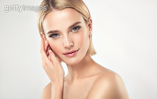Tender,romantic look in eyes of gorgeous, young,woman. Facial treatment ...