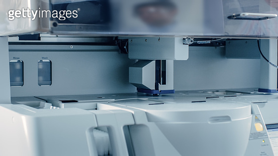 Close-up Shot of Automated Medical Equipmemt Working. Test Tube, Blood ...