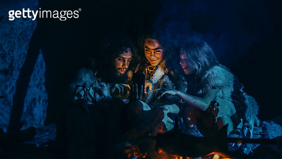 Tribe of Prehistoric, Primitive Hunter-Gatherers Wearing Animal Skins ...