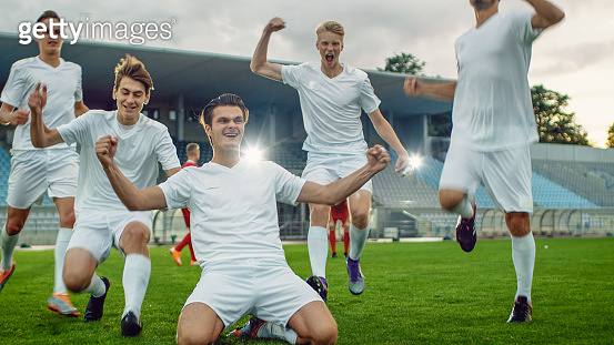 Captain of the Soccer Team Stands on His Knees Celebrates Awesome ...