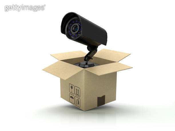 Cardboard Box with Security Camera on Wood Floor - 3D Rendering ...