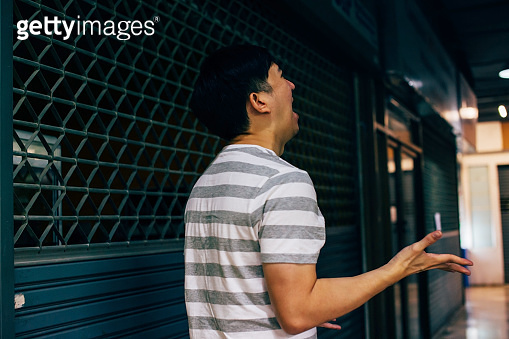 Young Asian angry and rage businessman retail shop owner having store ...
