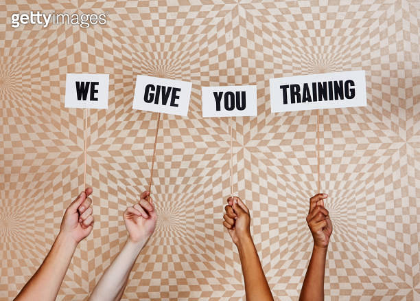 Four mixed hands hold signs 'We give you training' 이미지 (1139866433 ...