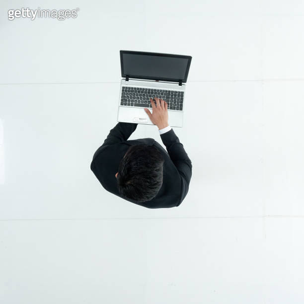 Full length / one man only / one person / directly above view / aerial ...