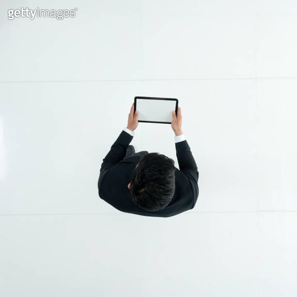 Full length / one man only / one person / directly above view / aerial ...
