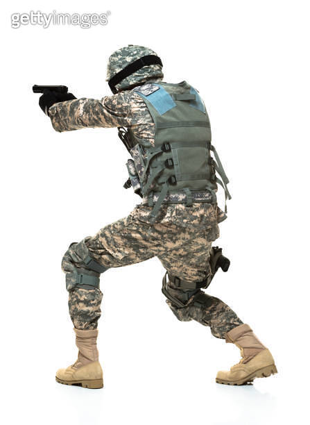 Rear view / back / looking away / sideways glance of armed forces ...