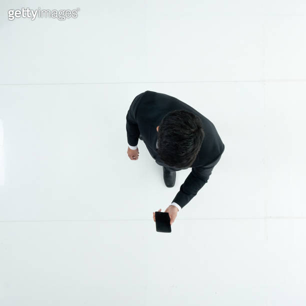 Full length / one man only / one person / directly above view / aerial ...
