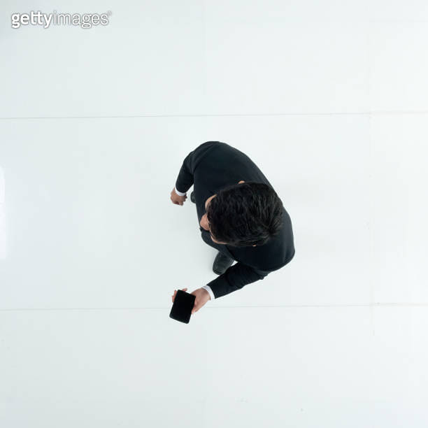 Full length / one man only / one person / directly above view / aerial ...