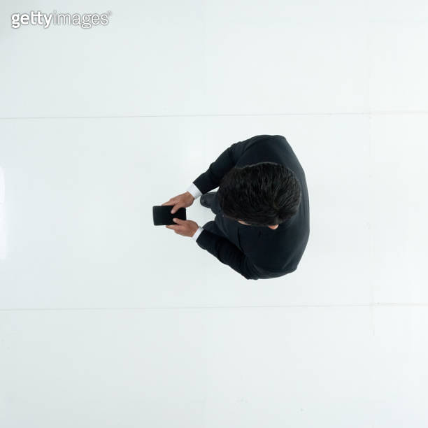 Full length / one man only / one person / directly above view / aerial ...