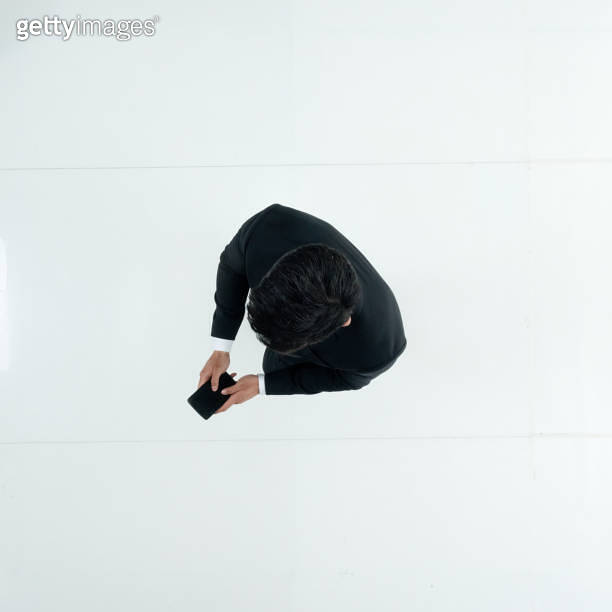 Full length / one man only / one person / directly above view / aerial ...