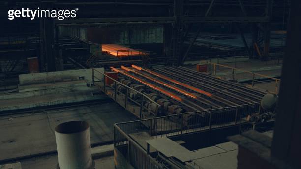 Steel mill factory - iron bar after molding are folded for cooling 이미지 ...