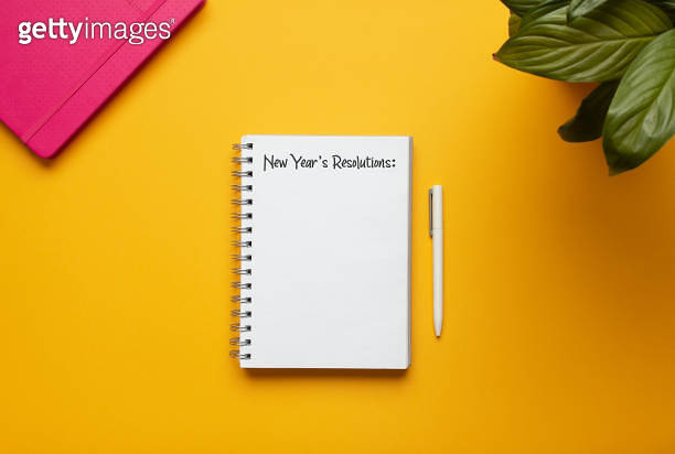 New year notebook with list of resolutions and objects (1187898863 ...