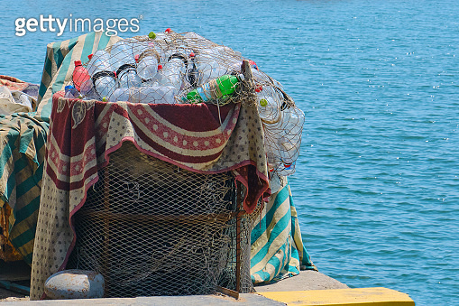 Plastic trash in fishing nets, collection of pollution at sea - Tunisia ...
