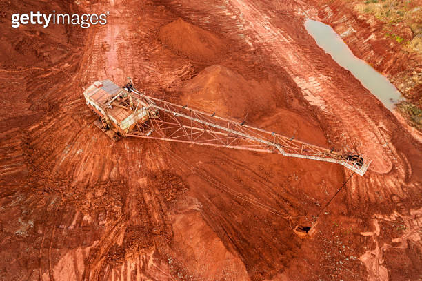 Aerial view of clay quarry with heavy machinery for digging. Keywords ...
