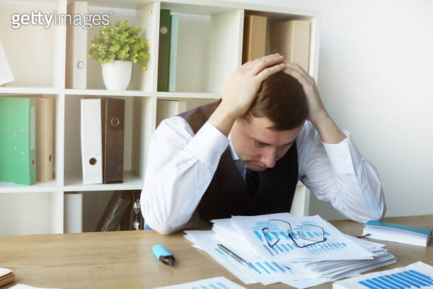 Sad accountant with financial annual report and documents. 이미지 ...