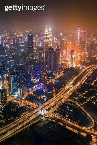 Aerial view of Kuala Lumpur Downtown and highways, Malaysia. Financial ...