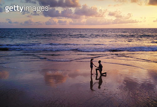 Happy Asian couple dating at the beach during travel honeymoon trip on ...