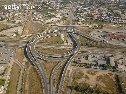 Aerial high drone in 4K flight over evening road traffic in Bucharest ...