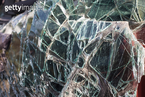 Broken front window of car in traffic accident. After the car crash ...