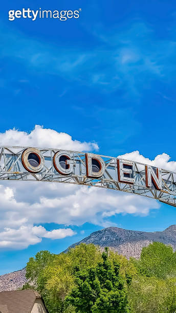 Vertical frame Welcome arch at the city of Ogden Utah against vivid ...