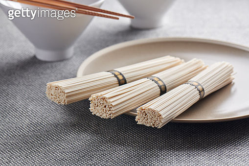 Raw wheat udon noodles on plate, Oriental and Asian cuisine (1124589249 ...