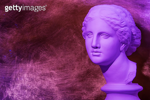 Gypsum copy of ancient statue Venus head on a textured background ...