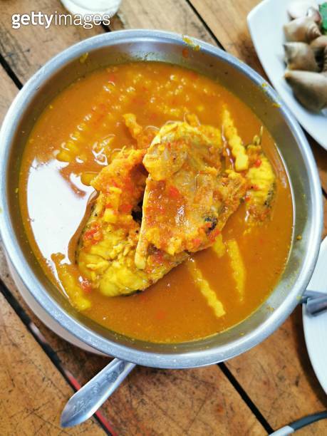 the yellow curry grouper Fish Seafood Soup in phuket town of Thailand ...