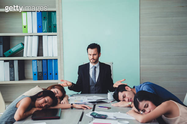 Employees Sleeping with the pile of documents with his angry boss in ...