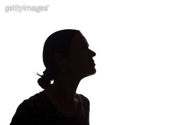 Portrait of young woman, pensive, thinking side view - silhouette ...