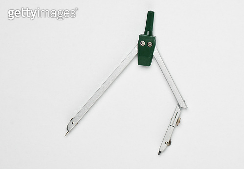 Engineering compasses for drawing on a white background. Top view. 이미지 ...