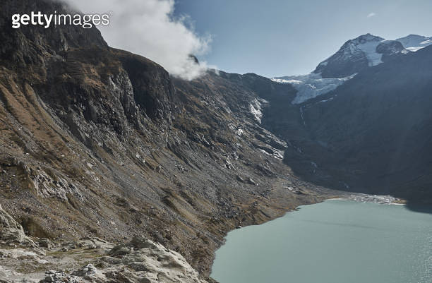 Panoramic view of Lake Triftsee, and the Trift Glacier (Triftbrucke ...