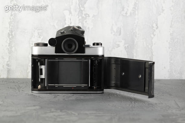 The old Medium format SLR Film camera on gray cement background. 이미지 ...