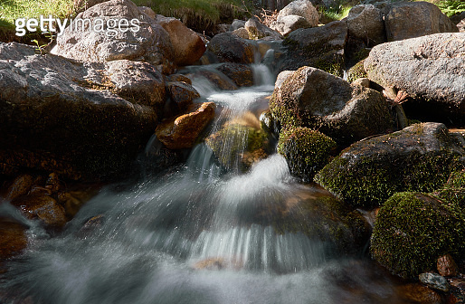 The Navacerrada River descends through the Valley of the Barranca in ...