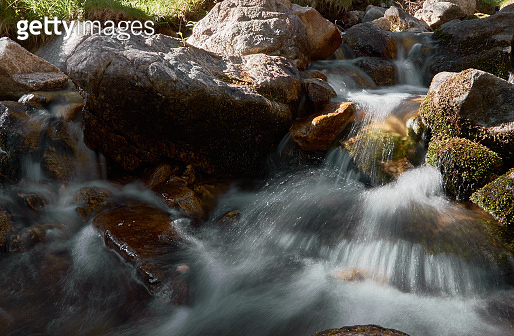 The Navacerrada River descends through the Valley of the Barranca in ...