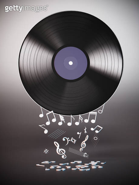 Musical notes and symbols falling to the ground from vintage vinyl ...