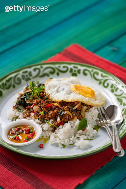 The famous spicy Thai dish called 'Pak Krapao Moo', fried pork with ...