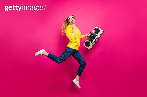 Full size photo of cool lady jumping high funky rocker dj wear casual ...