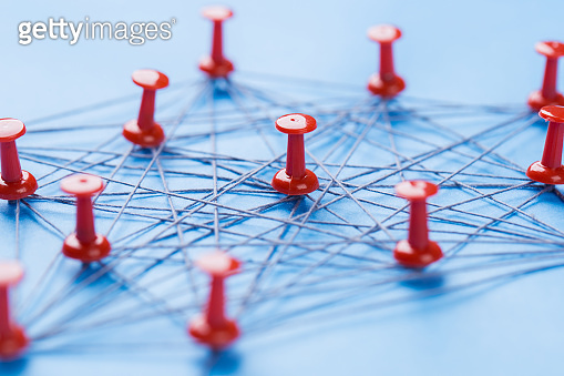 Small network of pins (Thumbtack)and string, An arrangement of colorful ...